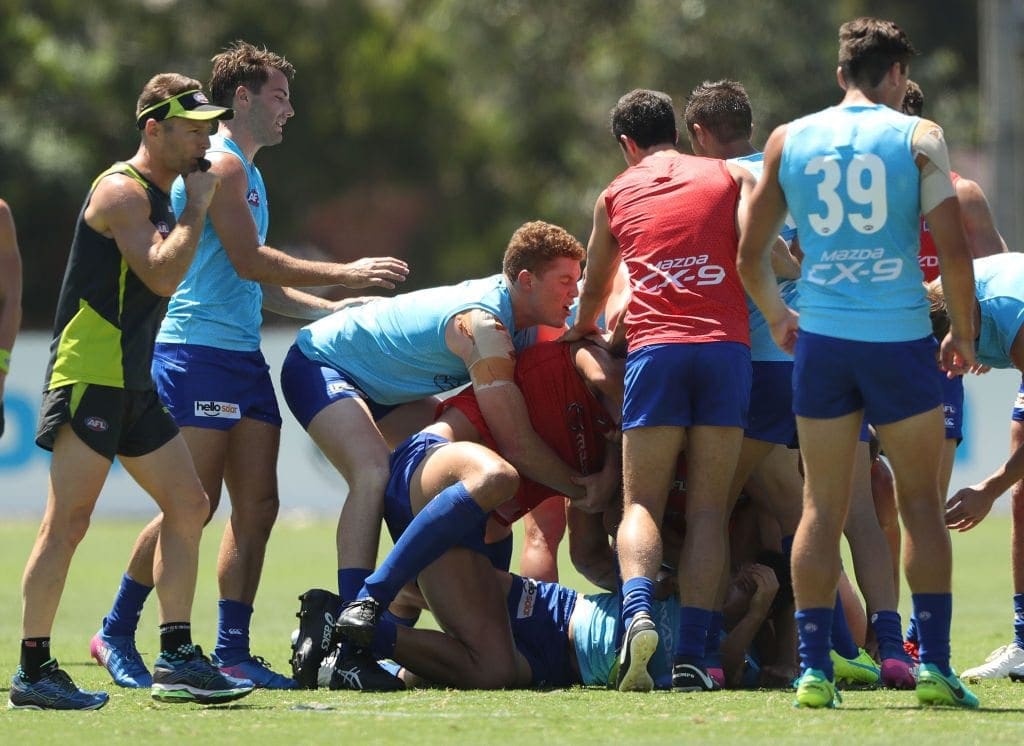 Multiple brawls erupt during fiery North Melbourne intra-club match ...