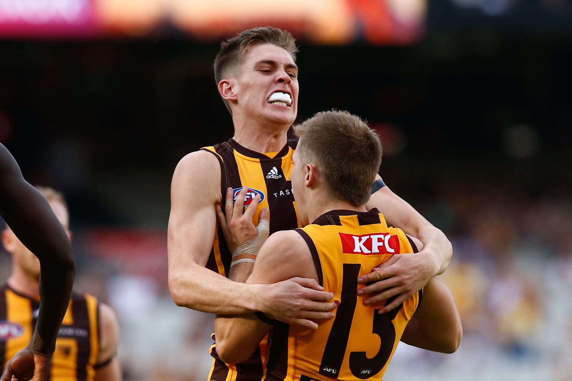 Essendon forward Peter Wright, Hawks gun Will Day some distance away ...