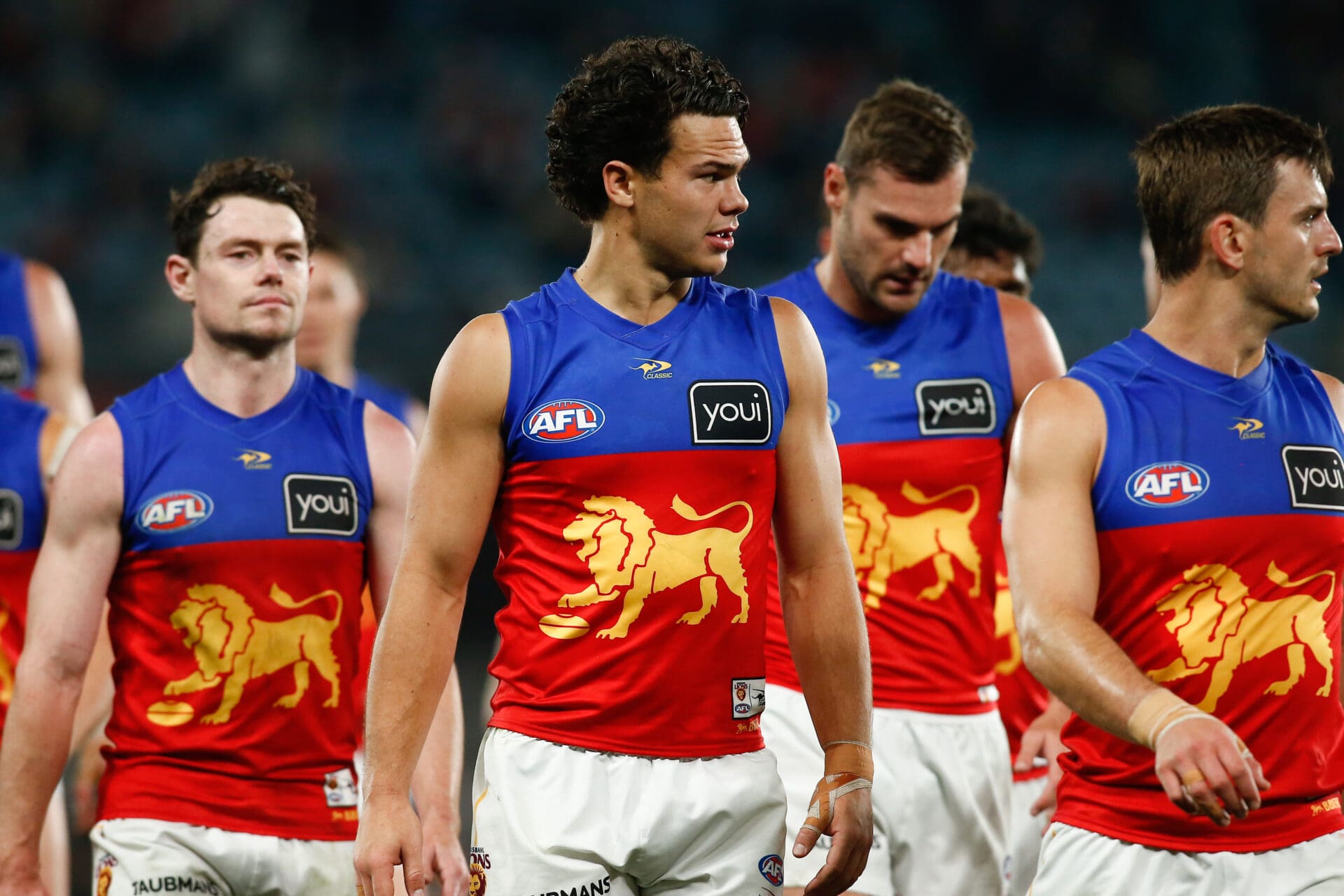 Brisbane forward 'carrying an injury' as Lions coach defends youngster ...