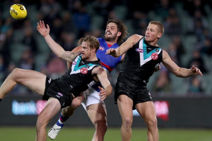 Port Adelaide defender reportedly "open to a trade": AFL trade news ...