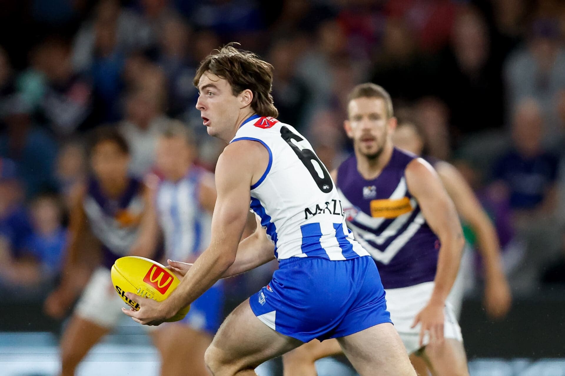 North Melbourne midfielder set to be eased into football, debutant in ...